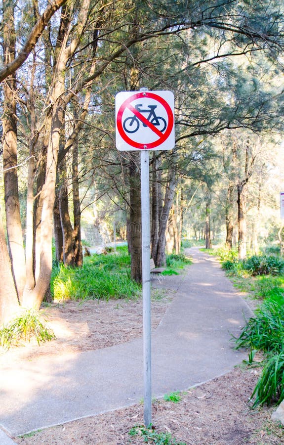 Warning Sign at the Public Park Walkway for Bicycles Prohibited. Stock ...