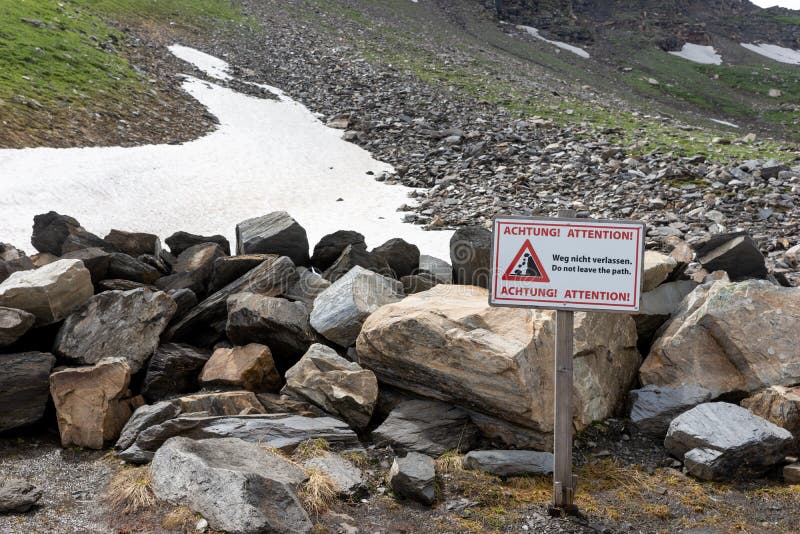 Warning Sign Rockfall with Text - Attention! Do Not Leave the Path ...