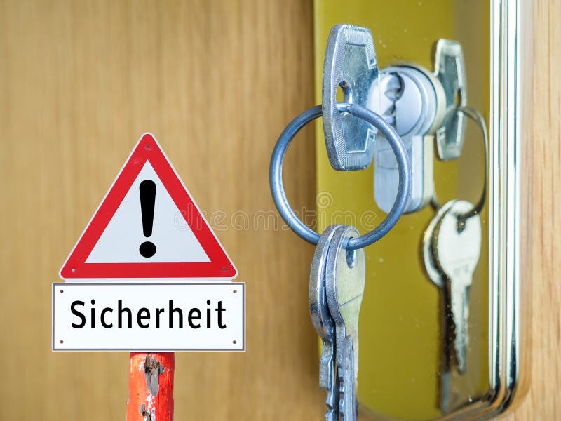 Warning Sign Security Key in German Stock Photo - Image of sign ...