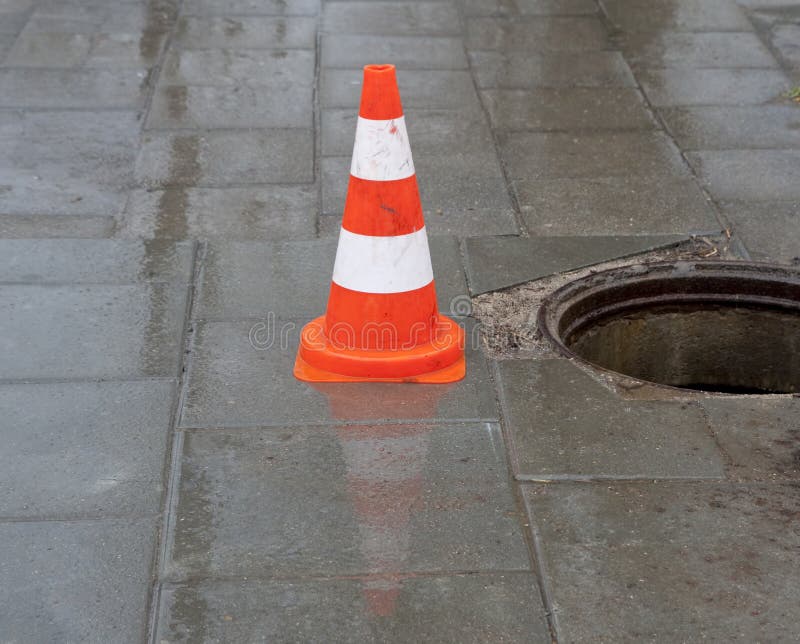 Warning Sign and Sewerage Hole Stock Image - Image of rainy, danger ...