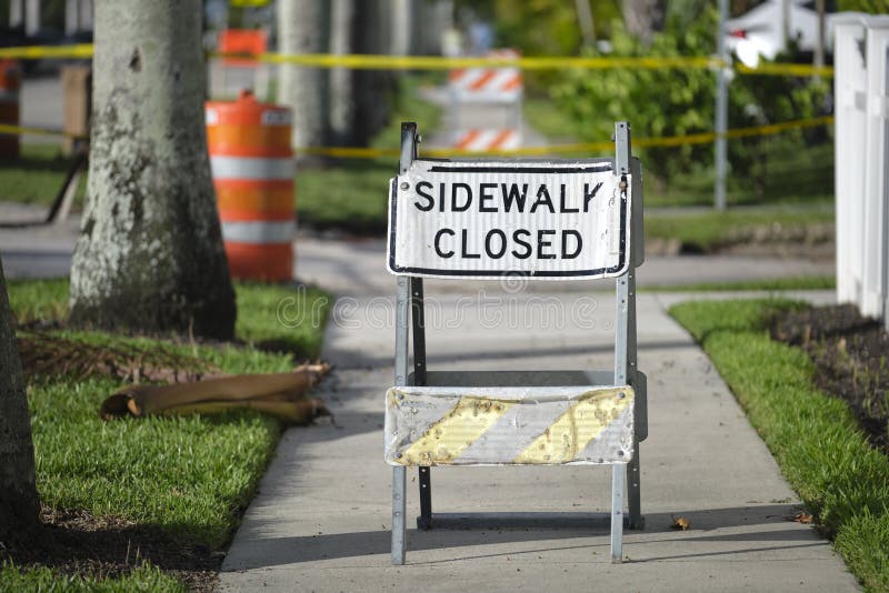 Warning Sign that Sidewalk is Closed at Street Construction Site ...