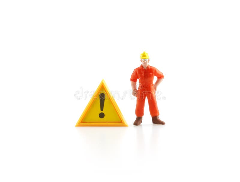 Warning Sign Under Construction with Miniature Figure Labo Stock Image ...