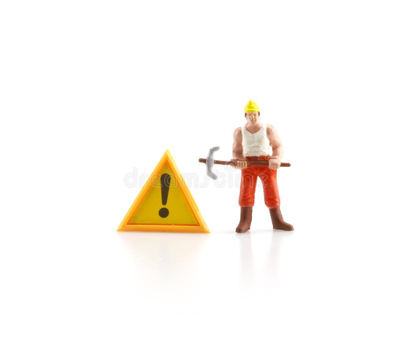 Warning Sign Under Construction with Miniature Figure Labo Stock Image ...