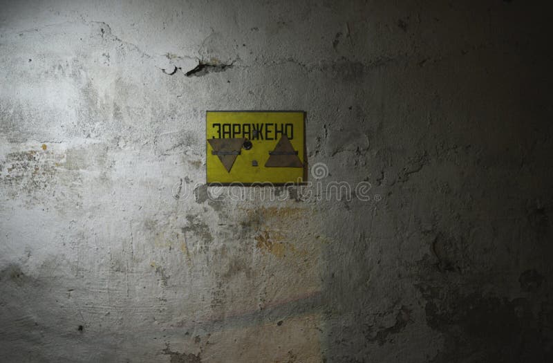 Warning sign on the wall. stock photo. Image of grey - 283854944