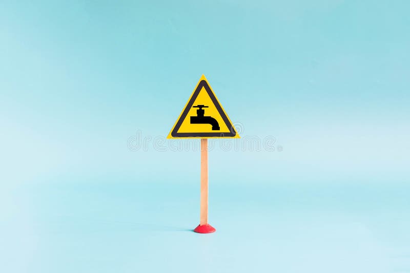 Warning Sign "water Tap" in the Form of a Yellow Triangle on a Light ...