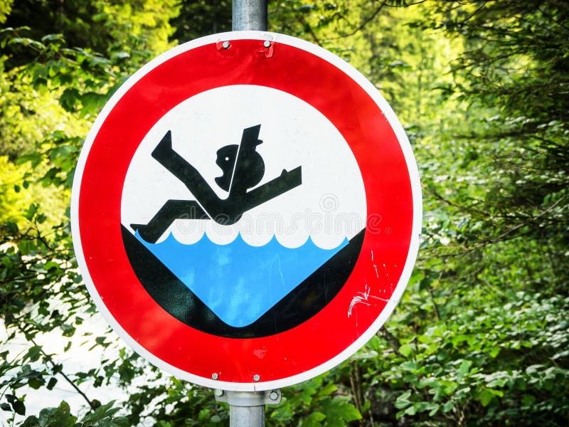 Warning sign stock photo. Image of stumbling, water, road - 51393118