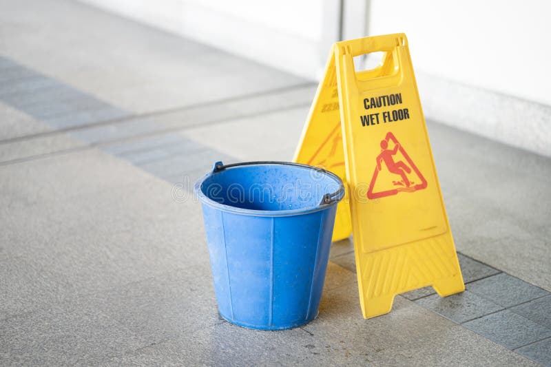 Wet floor caution sign stock photo. Image of danger - 284538174