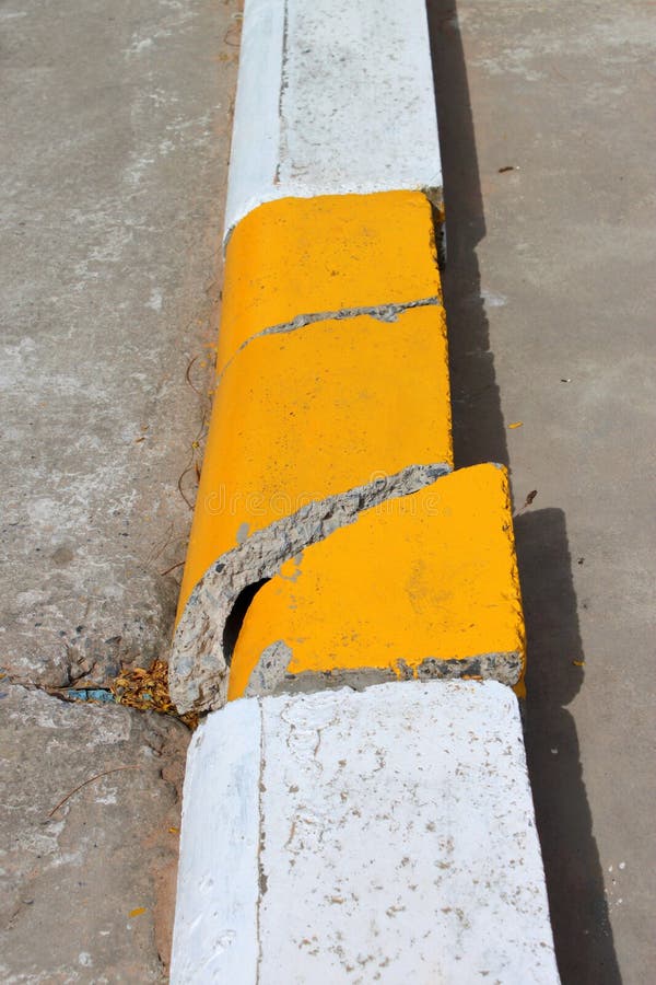 Warning Sign of White and Yellow Color on Road Stock Image - Image of ...