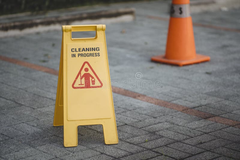 The Warning Signs Cleaning in Process the Floor of the Building Car ...