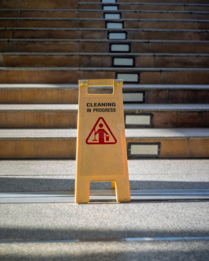 The Warning Signs Cleaning in Process the Floor of the Building. Stock ...