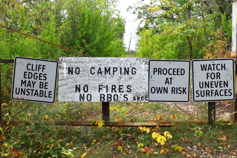 Warning Signs in the Park Area in the Forest Stock Photo - Image of ...