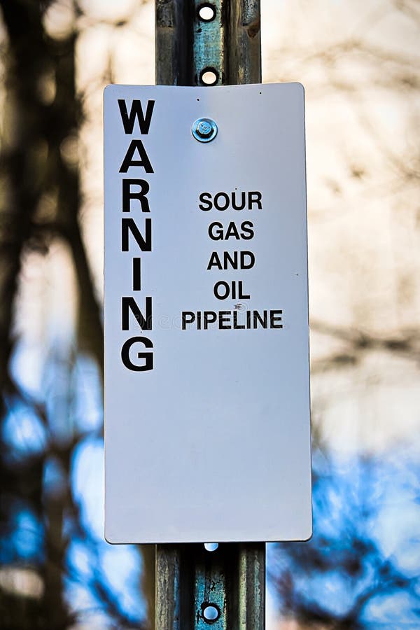 Warning Sour Gas and Oil Pipeline Sign Stock Image - Image of hazard ...