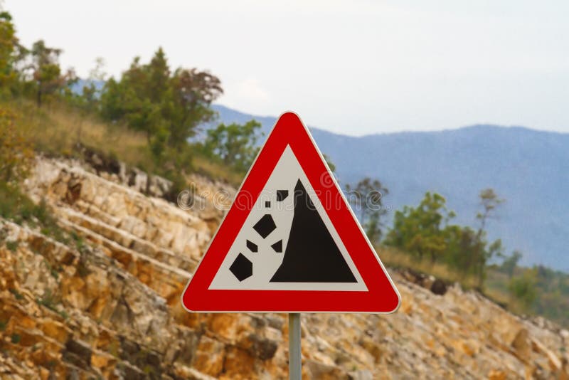 Warning Stone Fall Road Sign on Mountain Road Stock Photo - Image of ...