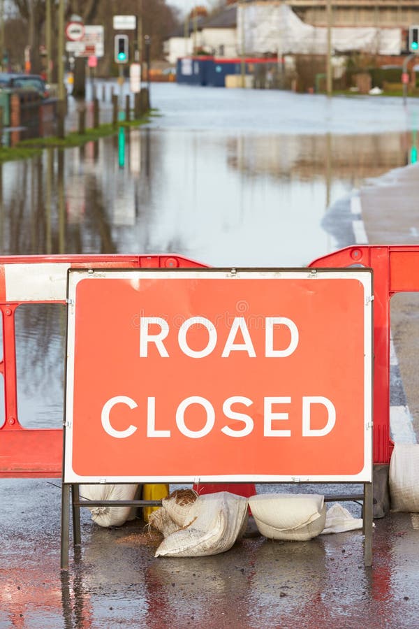 Warning Traffic Sign on Flooded Road with Fire Engine Stock Photo ...