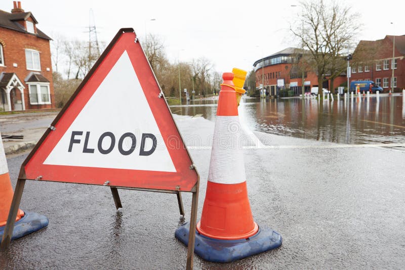 Warning Traffic Sign on Flooded Road with Fire Engine Stock Photo ...