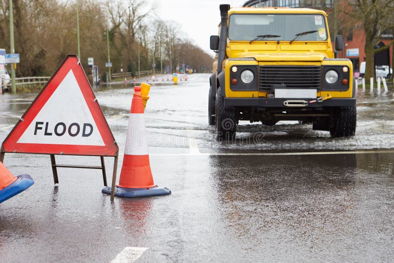 Warning Traffic Sign on Flooded Road Stock Photo - Image of weather ...