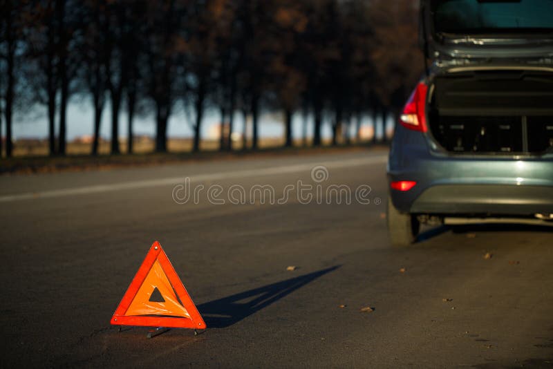 Warning Triangle with a Broken Down Car Stock Image - Image of recovery ...