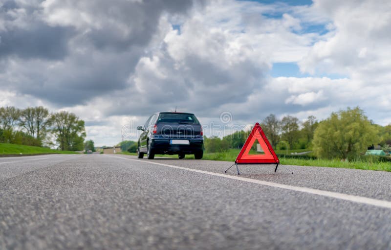 Warning Triangle in Front of a Car with a Breakdown Stock Image - Image ...