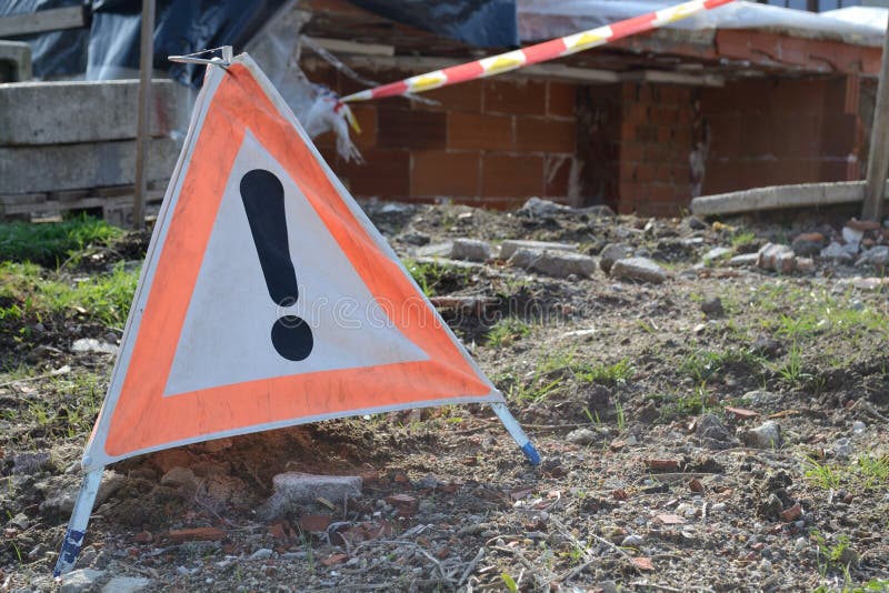 Warning Triangle in Front of Construction Site Stock Image - Image of ...
