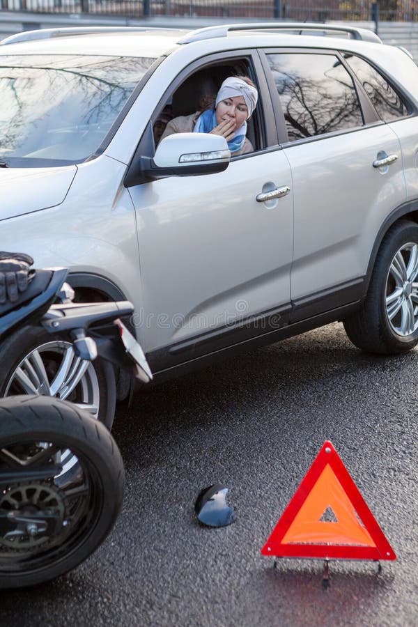 Triangle Warning Sign on Road with Driver in Car Stock Photo - Image of ...