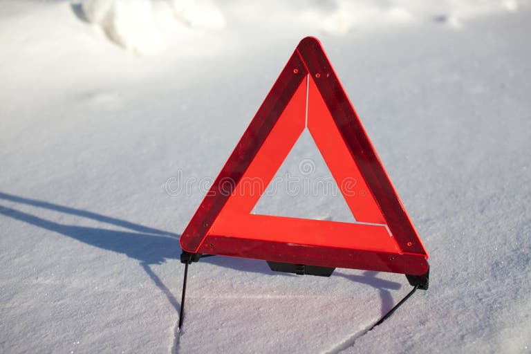 Warning triangle on snow stock image. Image of visible - 18128779