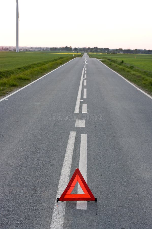 Warning Triangle on Straight Road Stock Image - Image of fields, bright ...