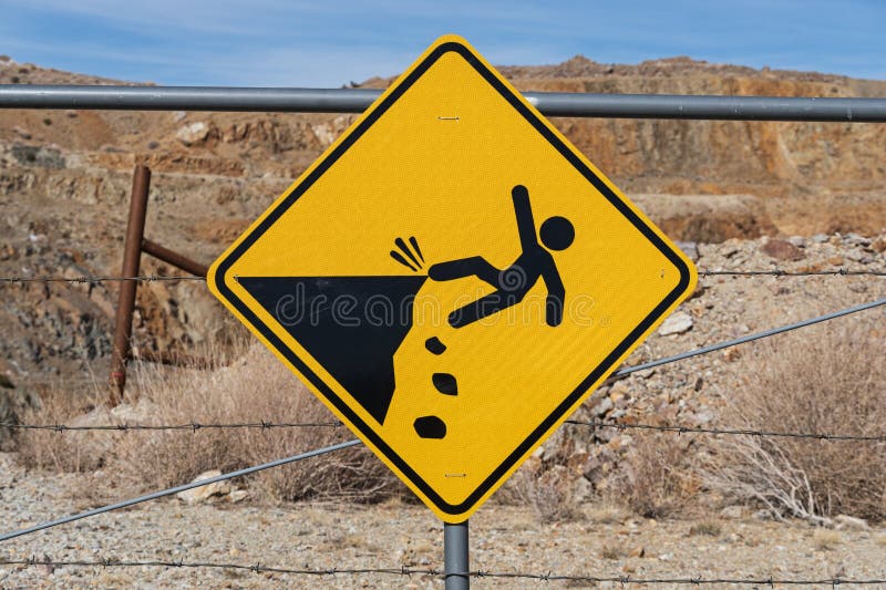 Warning Unstable Cliff Sign in Front of Open Pit Mine Stock Photo ...