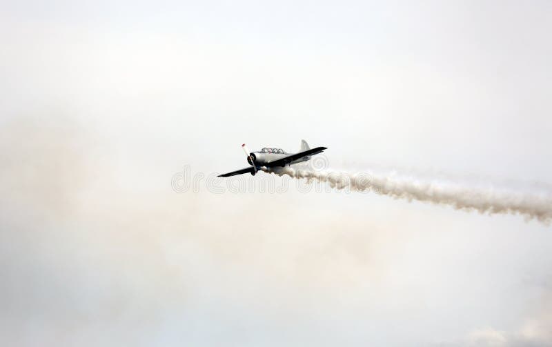 WARPLANE with Smoke from the Engine Stock Photo - Image of airplane ...