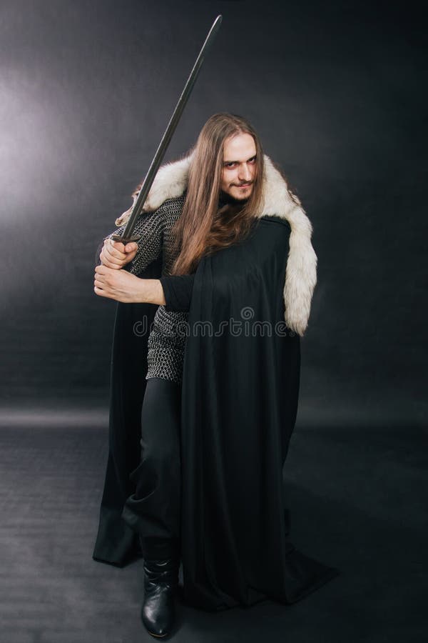 Warrior in Armor with a Sword. a Guy with Long Hair and a Beard, a Fox ...