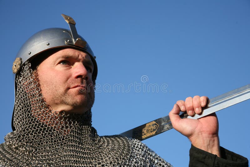 Warrior in Chain Mail, Sword Braced on Shoulder Stock Image - Image of ...