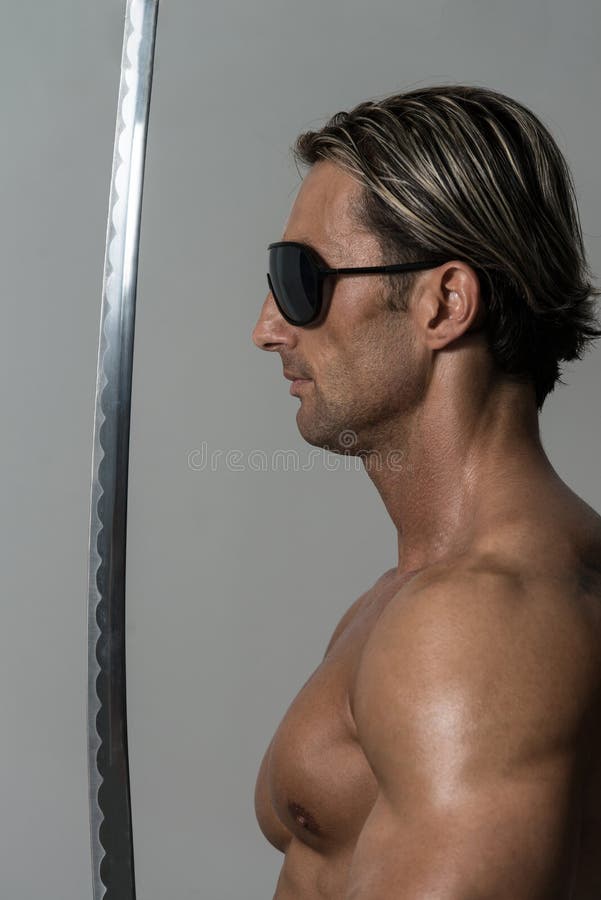 Warrior with Long Sword Over Grey Background Stock Photo - Image of ...