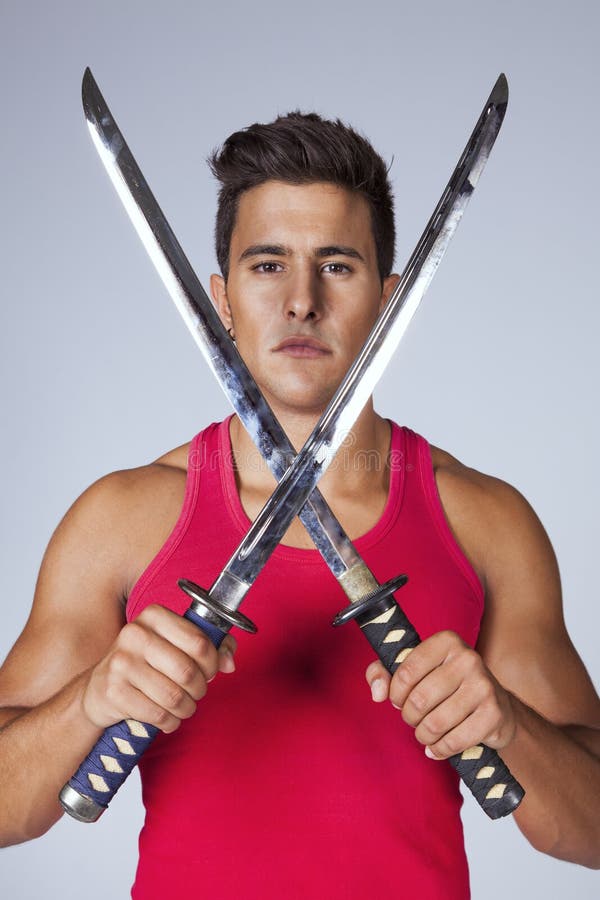 Strong Warrior with Ninja Swords Stock Photo - Image of athlete, killer ...