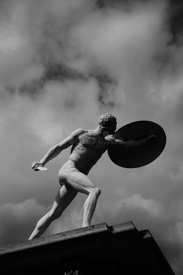 Warrior Statue with Sword and Shield Stock Photo - Image of statue ...