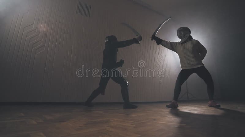Warriors are Fighting during Sword Battle Indoors in Slow Motion Stock ...