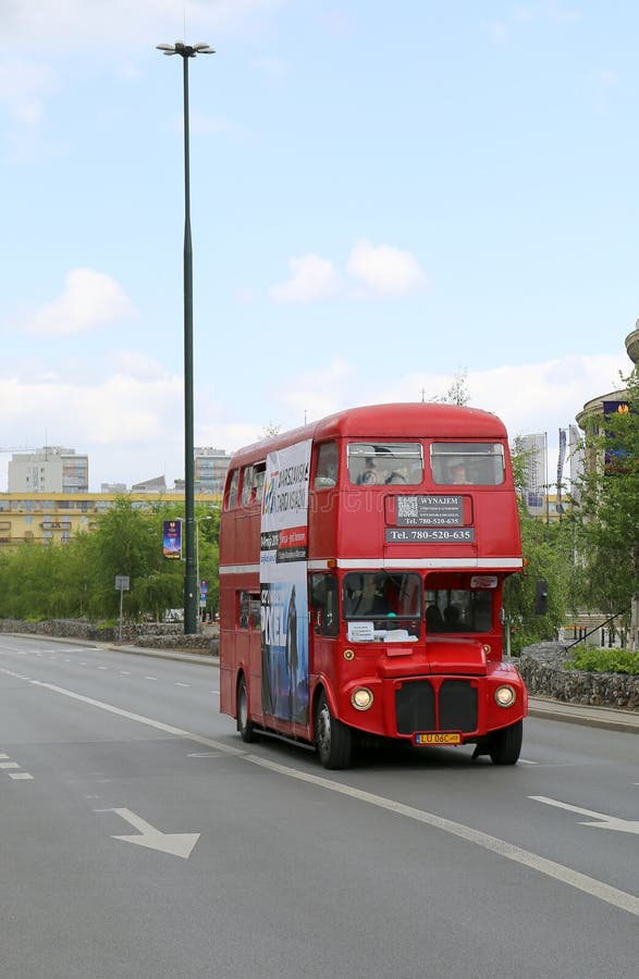 Red British Double Decker Bus with Passengers on the Road. May 17,2015 ...
