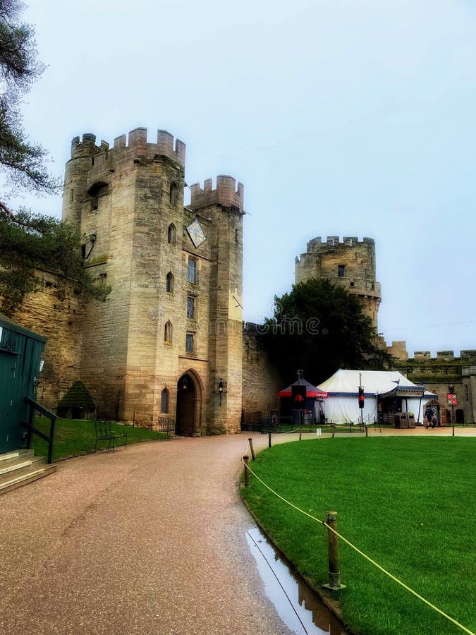 Warwick Castle and Gatehouse Stock Photo - Image of village, tree ...