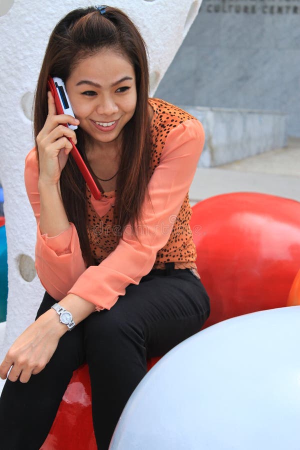 She Was Talking on the Phone. Stock Image - Image of asian, sort: 25683225