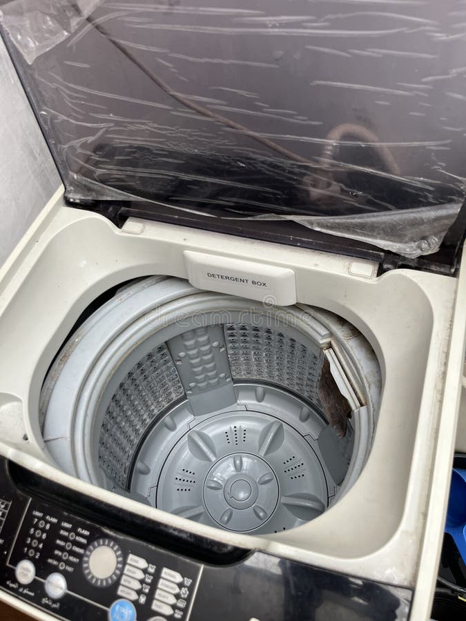 Wash Clothes in the Washing Machine Then Dry the Clothes in a Row on ...