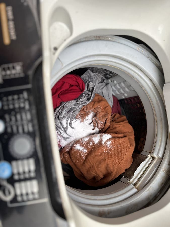 Wash Clothes in the Washing Machine Then Dry the Clothes in a Row on ...