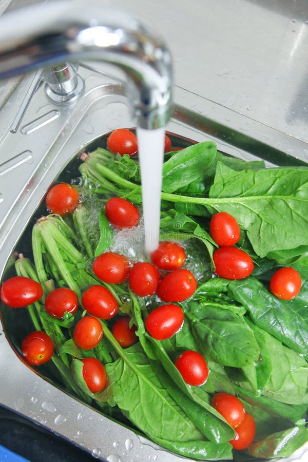 Wash vegetables stock image. Image of spinach, faucet - 22596671