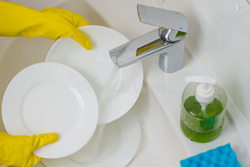 Wash white plates stock image. Image of kitchen, hygiene - 48909759
