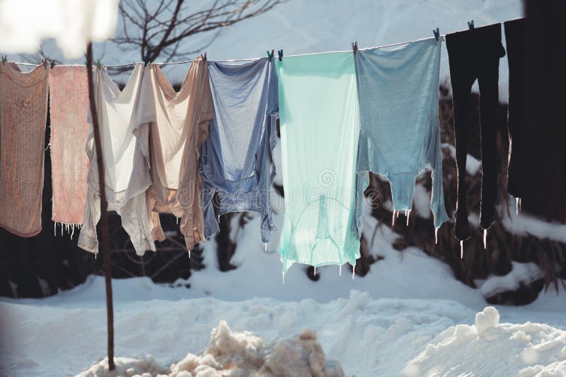 Washed Clothes Hang on a String in the Cold, Hardened Stock Photo ...