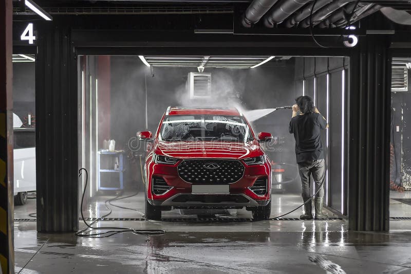 A Washer at a Car Wash Washes a Red Car Editorial Stock Photo - Image ...