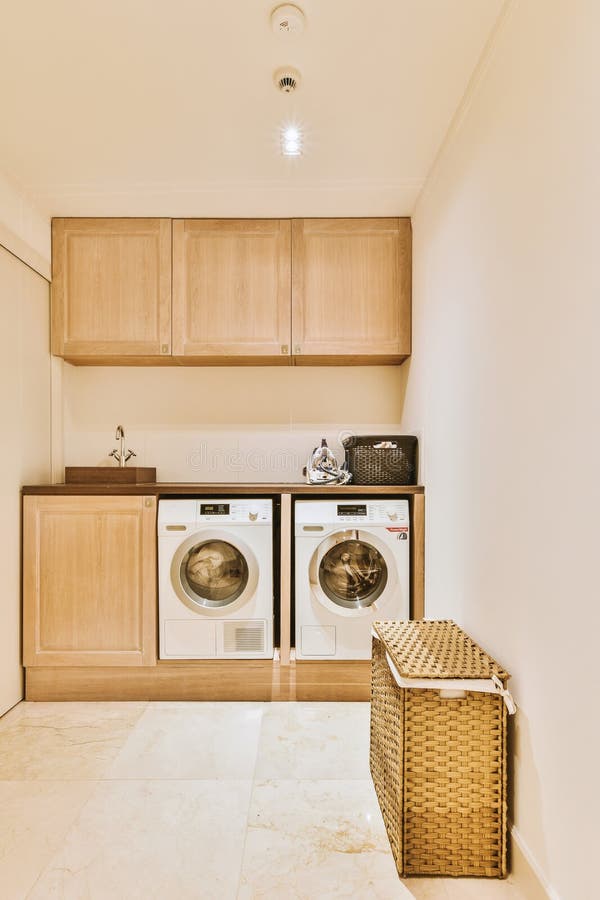 A Washer and Dryer in a Laundry Room Stock Image - Image of panel ...