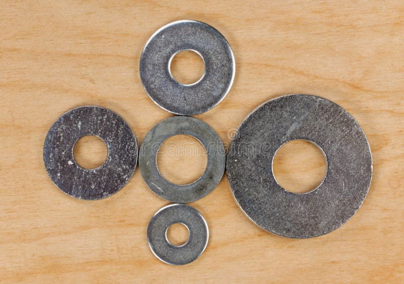 Washer on a wooden board stock image. Image of pattern - 30376835