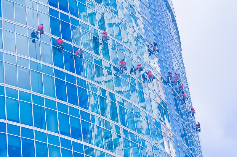Washers wash the windows. editorial image. Image of office - 42853120