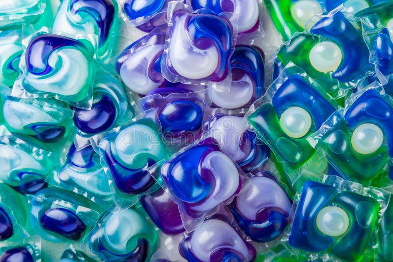 Washing Capsules. Capsules with Liquid Powder for Washing Things in the ...