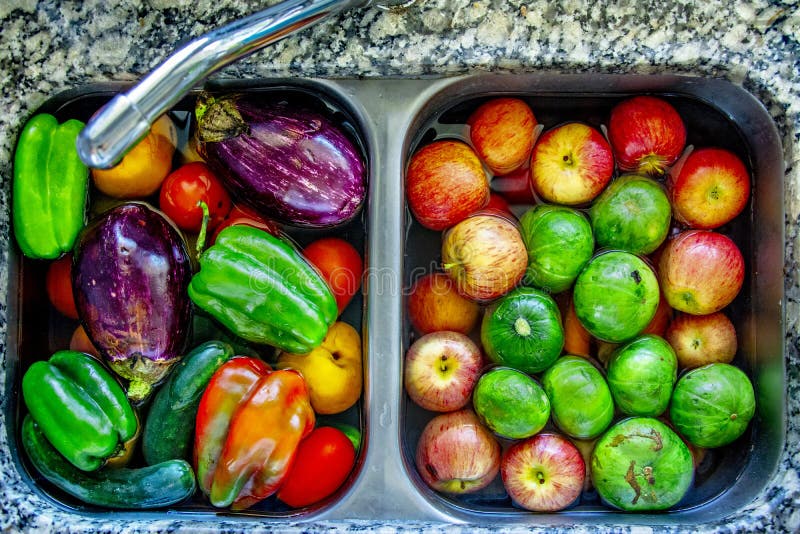 Washing and Cleaning Vegetables in Water and Chlorine Stock Photo ...