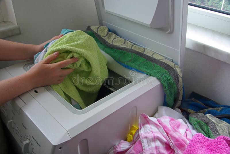 Washing clothes 01 stock image. Image of cleaner, loading - 6557905