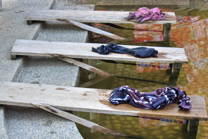 Washing clothes waterside stock image. Image of arranged - 39464137